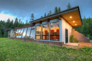 Living In An Earthship To Go Totally Off Grid - The Tiny Life